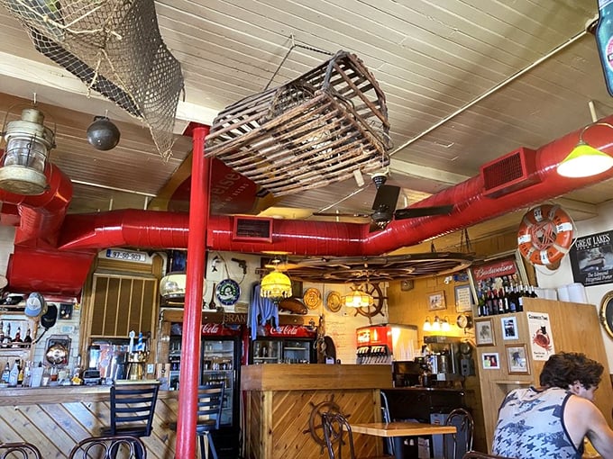 Fishing nets and lobster traps hanging from the ceiling aren't just decoration—they're a reminder that what's on your plate had a previous life.