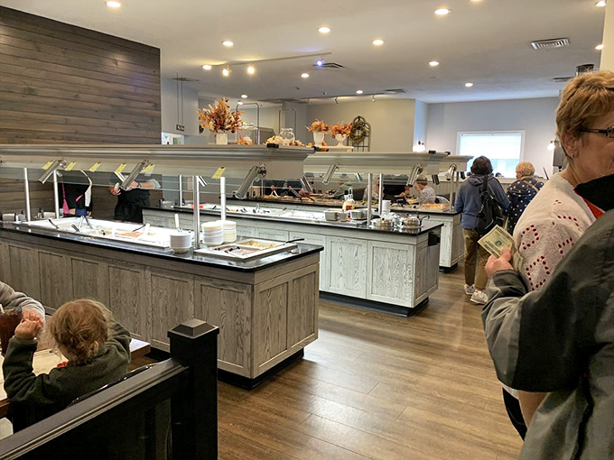 Modern buffet stations maintain the tradition while keeping everything spotlessly clean. The wood-paneled serving area blends rustic charm with practical functionality.