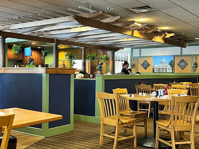 The thoughtful interior design balances nostalgic diner elements with comfortable seating, creating a space where lingering over coffee feels natural.