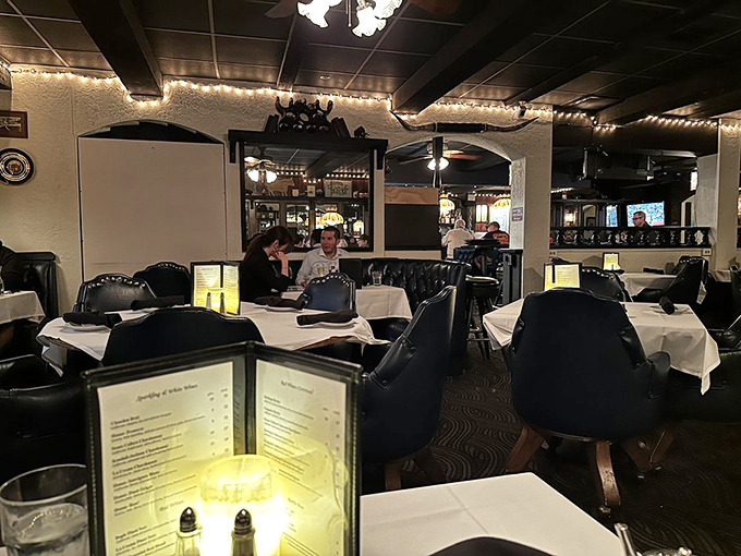 The dining room where calories don't count and diet plans go to die. White tablecloths signal you're in for a proper meal, not a casual bite.