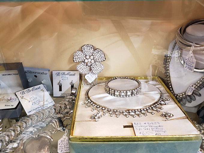 Vintage costume jewelry waiting to transform a modern outfit&mdash;because nothing says "conversation starter" like a brooch with more sparkle than your personality.