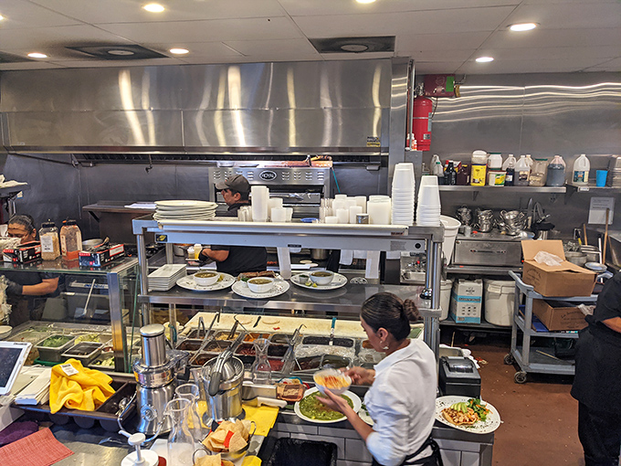 Where the magic happens: The bustling kitchen reveals the choreographed dance of professionals turning simple ingredients into extraordinary meals.