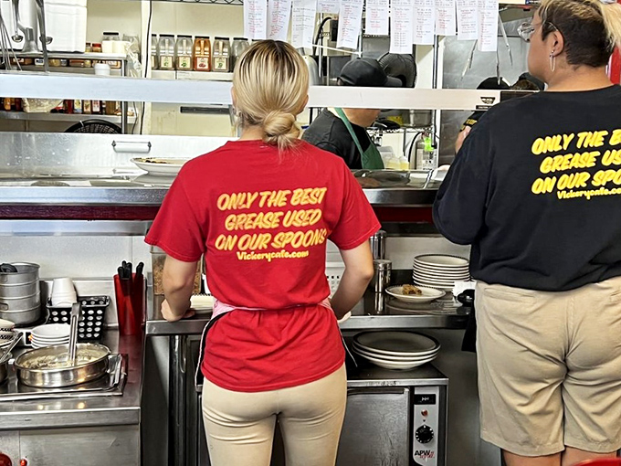 The staff shirts say it all: "Only the best grease used on our spoons." When a restaurant jokes about its grease, you know you're in good hands.