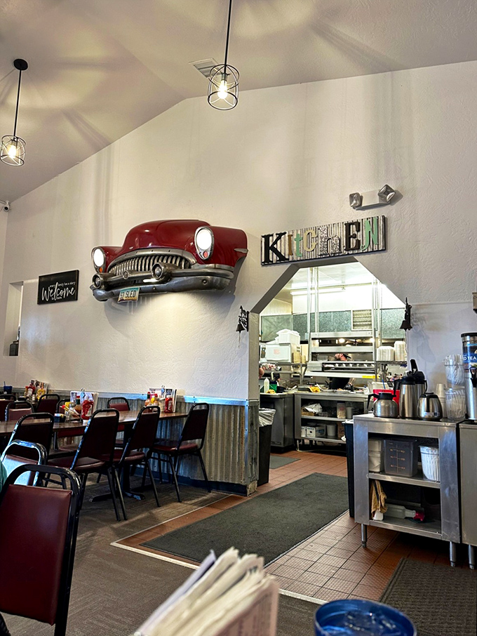 That vintage car mounted on the wall isn't just decor&mdash;it's watching over the kitchen like an automotive guardian angel of flavor.