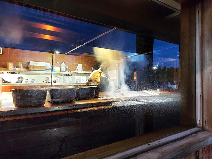 A glimpse into the kitchen where the magic happens. That smoke and sizzle is the sound of vacation memories being forged in fire. 