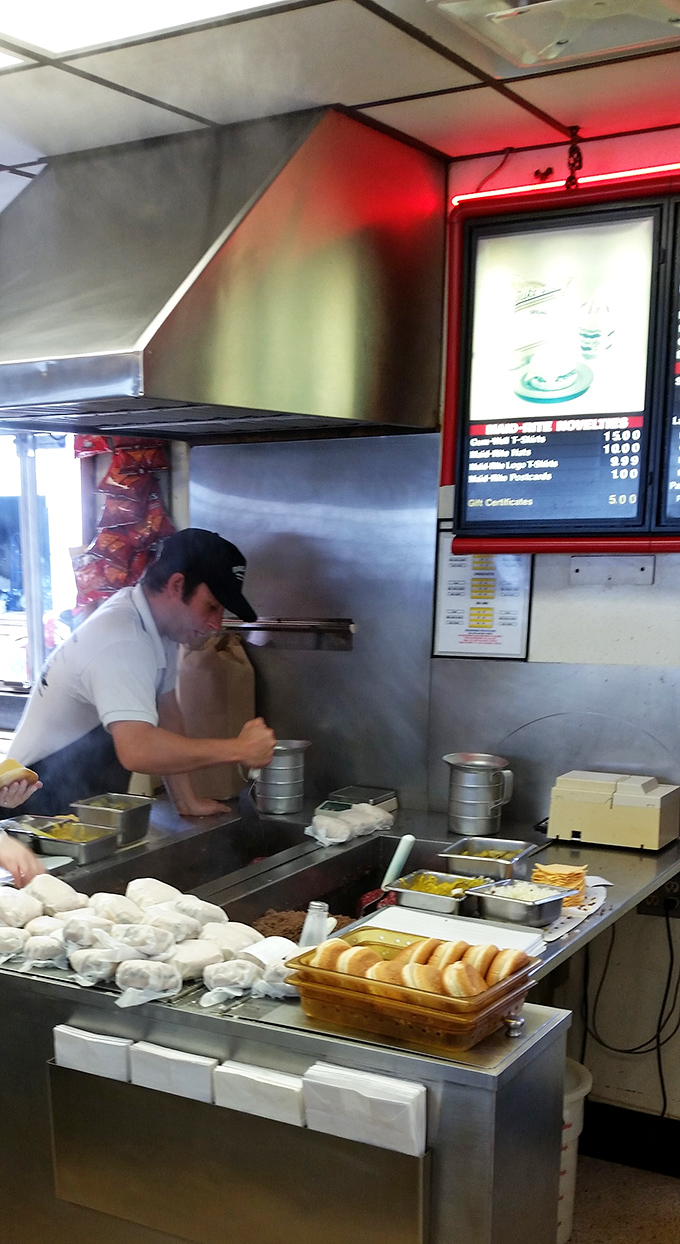 The assembly line of satisfaction&mdash;fresh buns waiting for their destiny, while the cook prepares another batch of that famous loose meat.