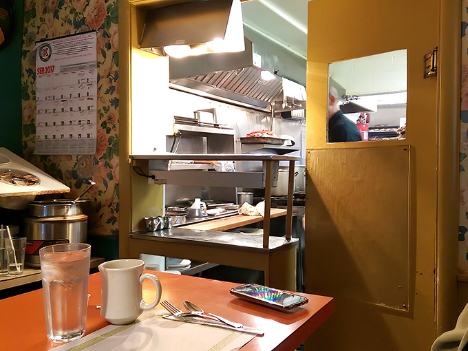 A glimpse into the kitchen battlefield where breakfast dreams are forged&mdash;no fancy equipment, just skill and a well-seasoned flat-top.