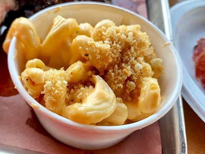 Mac and cheese with a golden crown of crispy breadcrumbs &ndash; comfort food wearing its Sunday best while still keeping things real.
