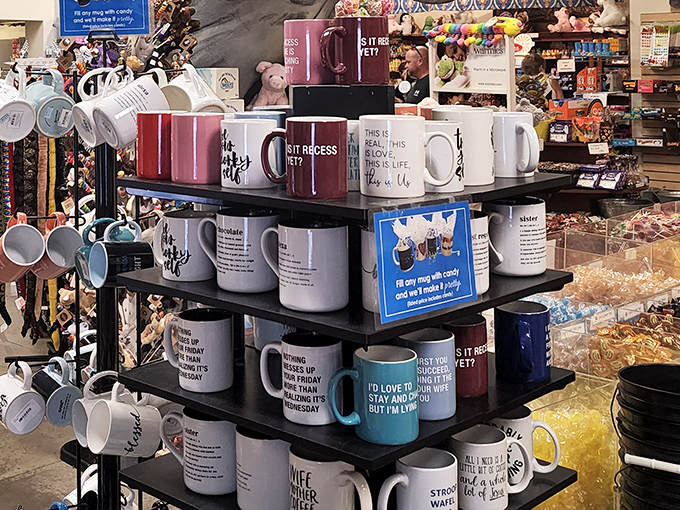 Coffee mugs featuring witty sayings provide the perfect vessel for enjoying hot cocoa after fudge sampling.