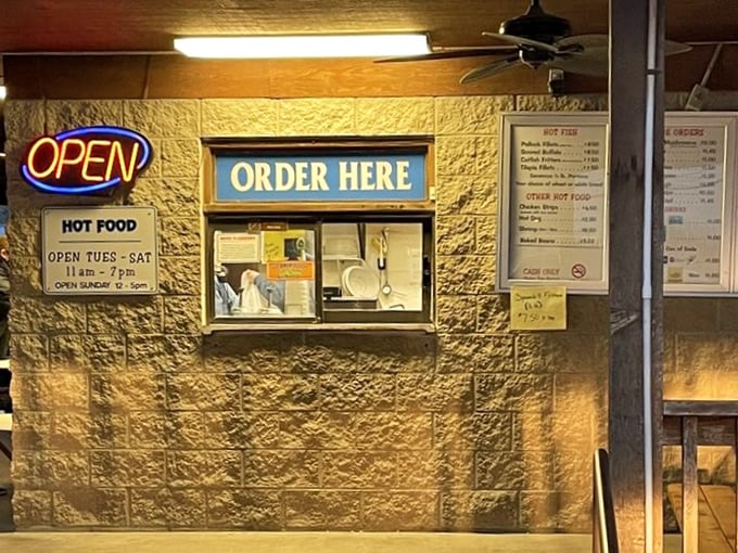 "ORDER HERE" says the sign, and generations of river folk have happily complied. The neon "OPEN" sign might be the most modern thing about this timeless establishment.