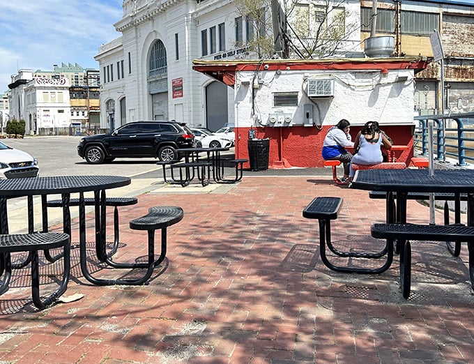 The perfect urban picnic setting. These outdoor tables have witnessed countless first bites, food epiphanies, and the occasional battle with seagulls.