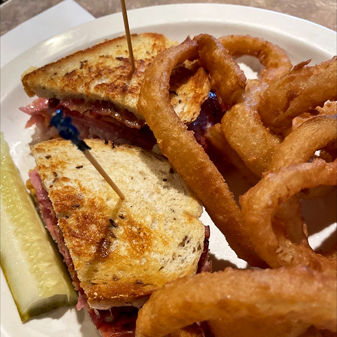 The patty melt and onion rings combo&mdash;proof that sometimes the simplest pleasures are the most profound.