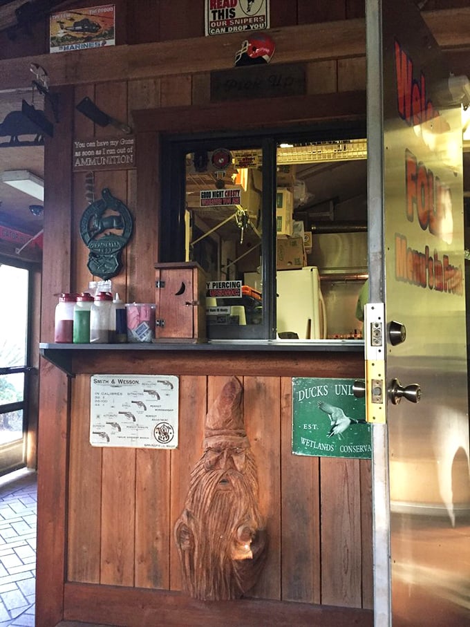 Behind this window, barbecue magic happens. Note the wood carving&mdash;even the decor has embraced the smokehouse aesthetic.