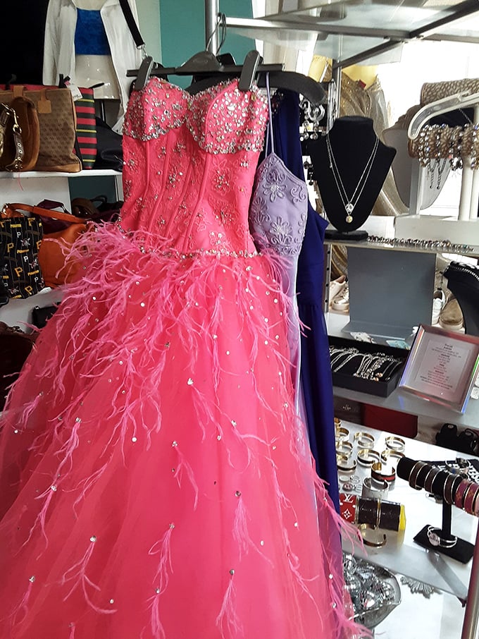 Not just a dress, but a pink confection of feathers and sparkle that practically demands a grand entrance and paparazzi.