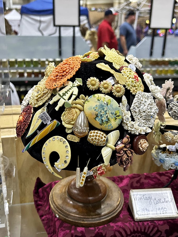 A garden of jewelry blooms on black velvet. This spectacular brooch bouquet transforms yesterday's fashion into today's wearable art installation.