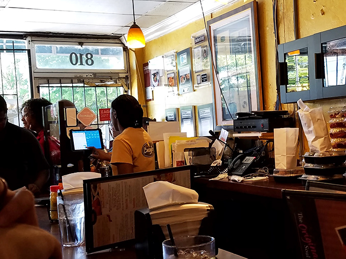 Where the magic begins: the bustling front counter where hungry patrons place orders that will soon change their definition of soul food.