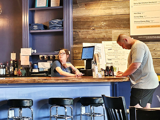 The counter experience: where burger dreams are ordered, anticipation builds, and the staff somehow makes waiting feel like part of the fun.