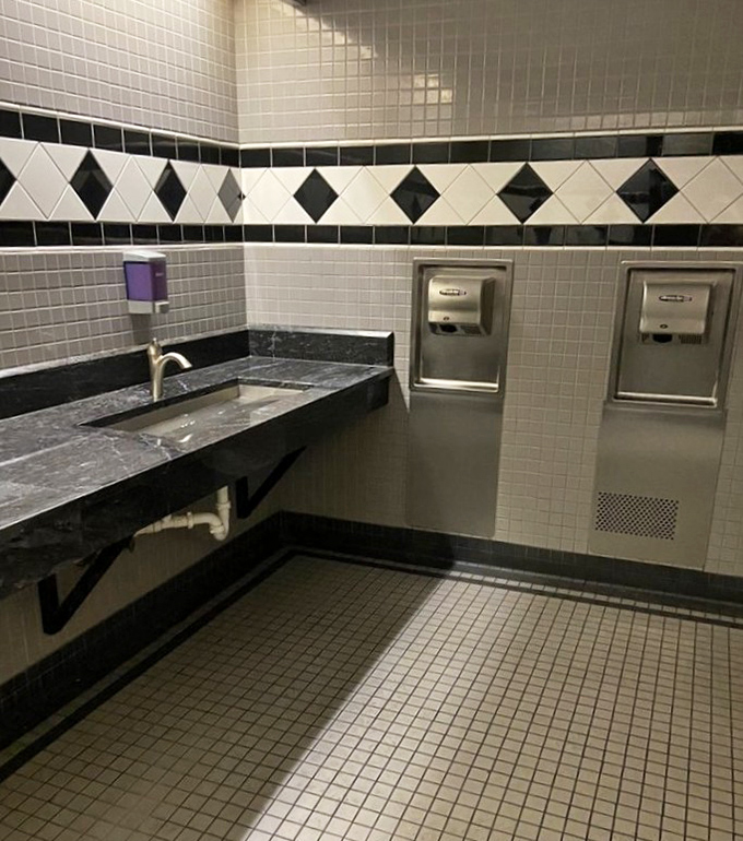 Even the restroom shows attention to detail with its classic black and white tile pattern&mdash;because excellence doesn't take bathroom breaks.
