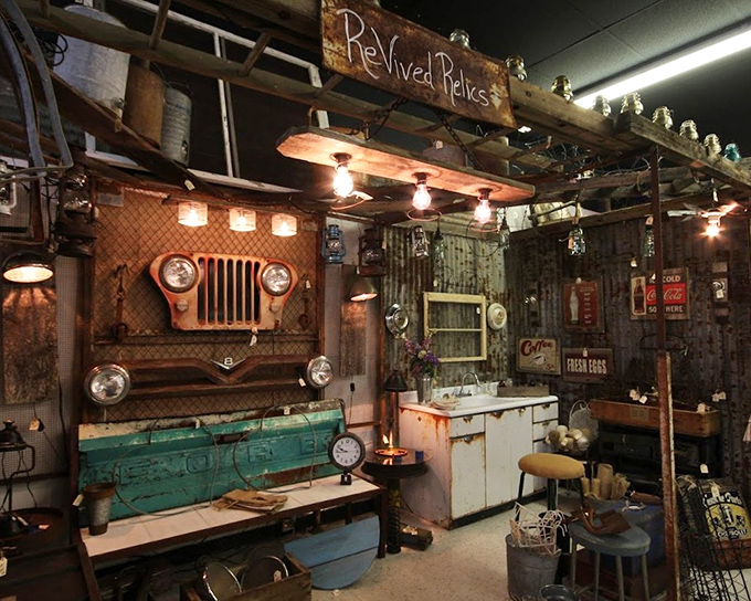 Automotive nostalgia meets kitchen practicality in this "Revived Relics" booth, where a Jeep grille watches over your shopping decisions.