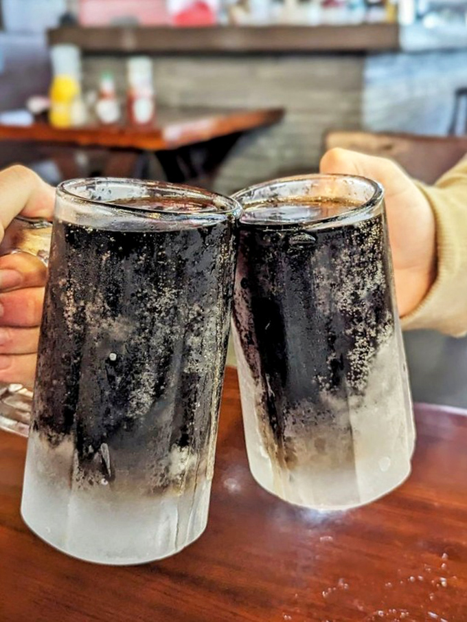 Frosty mugs of dark goodness&mdash;because nothing cuts through smoky fish flavors like an ice-cold root beer or cola.