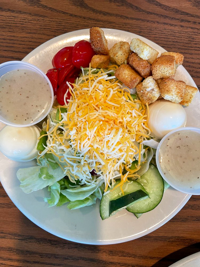 A salad that doesn't apologize for being a salad. Cheese, croutons, and hard-boiled eggs make eating vegetables feel less like punishment and more like pleasure.