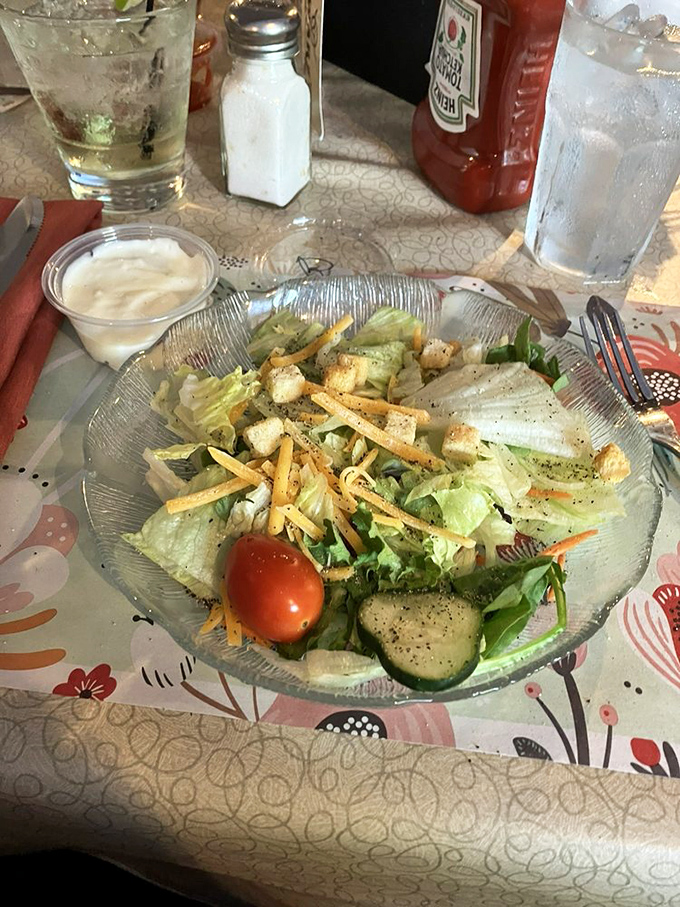 The humble house salad&mdash;crisp, fresh, and thoughtfully composed&mdash;a palate-cleansing prelude to the richness that follows.