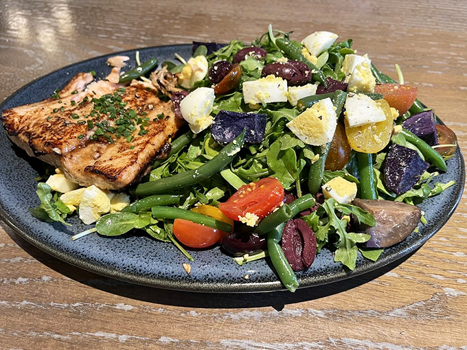 A salad that doesn't apologize for being healthy, thanks to that perfectly seared salmon. Proof that "salad for dinner" can be a celebration.