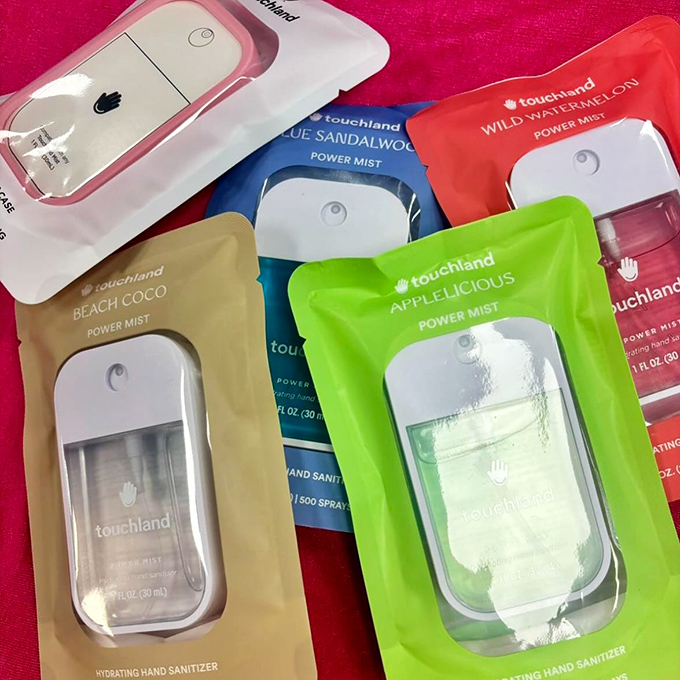 Touchland hand sanitizers in rainbow colors make staying clean feel like a fashion statement itself.