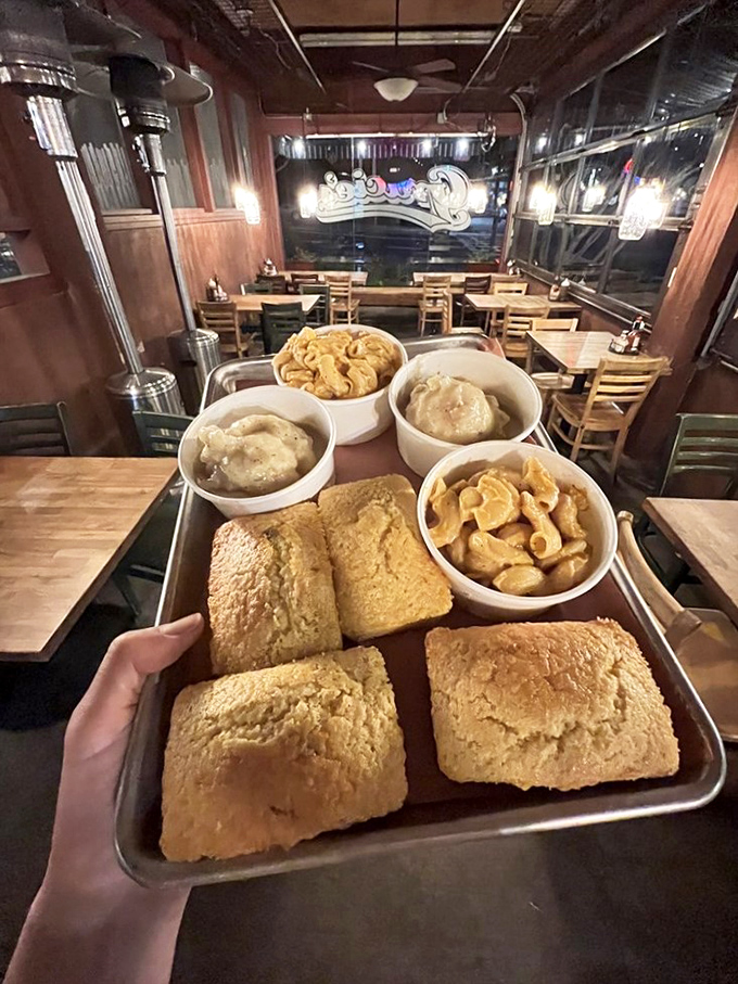 Cornbread squares and sides lined up like delicious soldiers ready to support the main meat mission ahead.