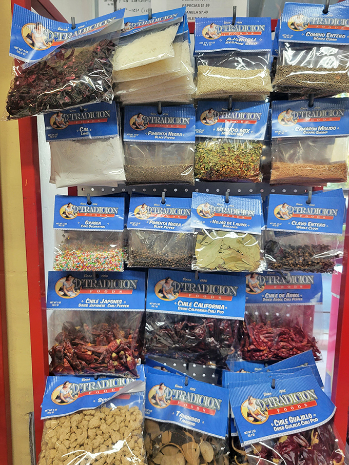 This spice display isn't just ingredients&mdash;it's potential. Each packet contains the building blocks of dishes that have been perfected over centuries of Mexican cooking tradition.