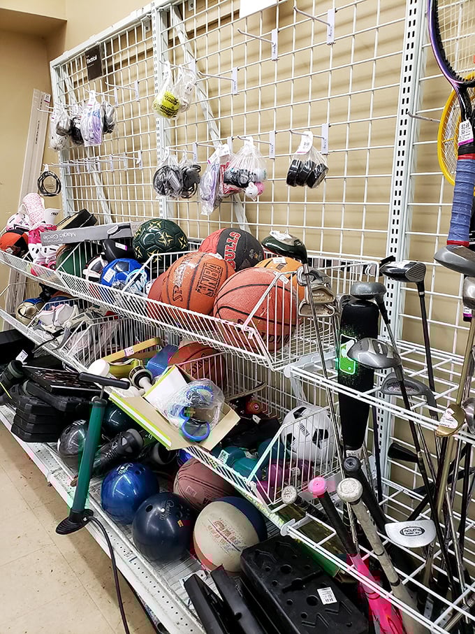 Sports equipment graveyard: where basketballs, golf clubs and tennis rackets patiently wait for someone to fulfill their New Year's resolution.