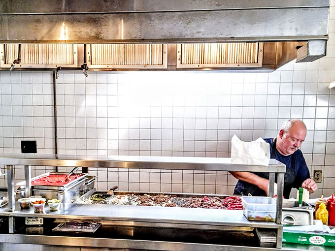 Behind every great sandwich is a dedicated craftsperson, working their magic on a well-seasoned grill that's seen thousands of lunches.