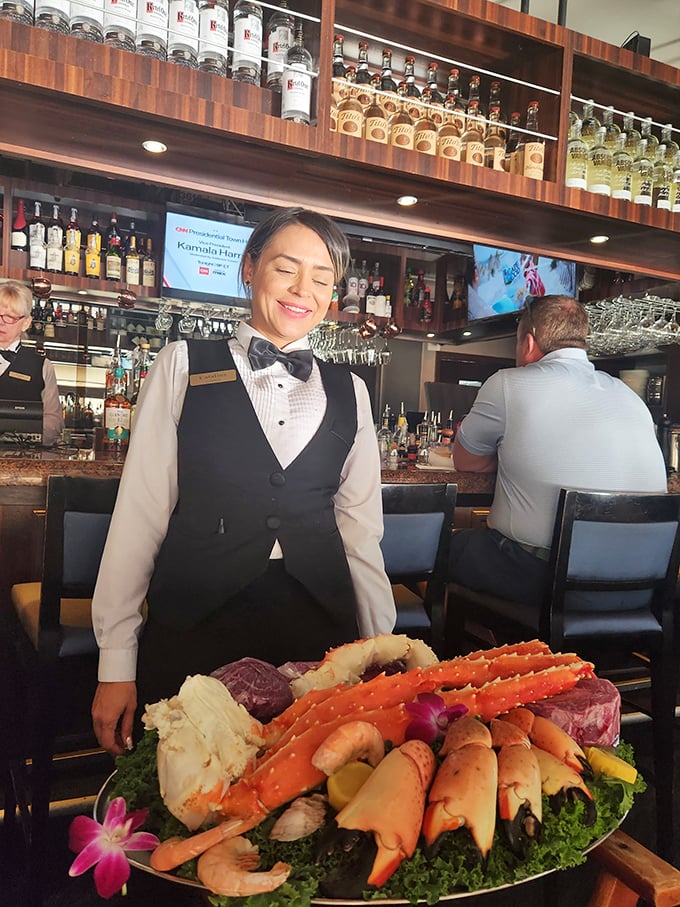 When your seafood platter arrives with this much fanfare, you know you're in for something special. Fresh catches presented with pride.