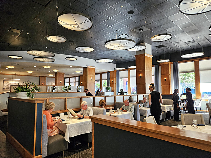 The dining room hums with the satisfied murmurs of patrons who've discovered that great seafood doesn't require an ocean view.