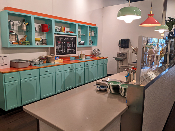 Mint-green cabinets that would make your Pinterest board jealous. Retro-chic kitchen vibes that say "serious about coffee."