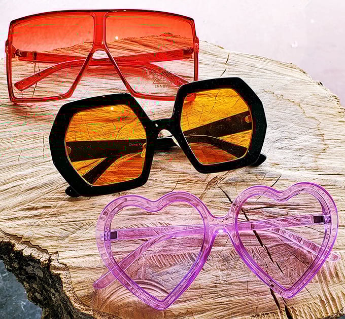 Retro eyewear that transforms ordinary faces into fashion statements&mdash;choose your character: disco queen, 70s film star, or heart-eyed romantic.