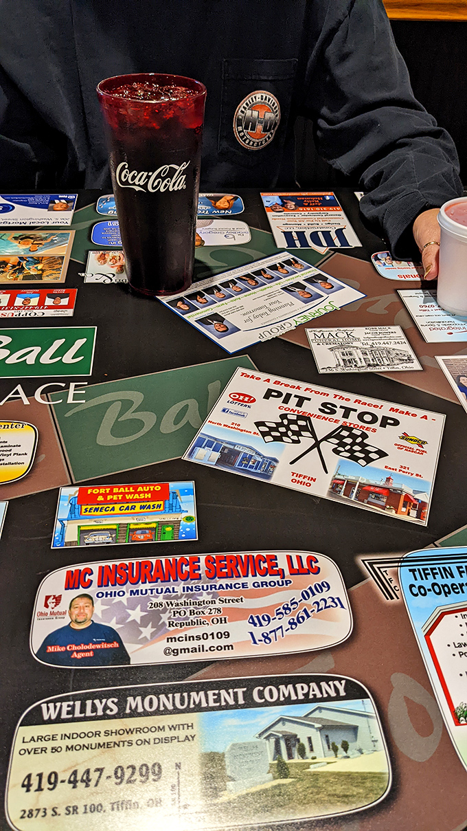 Even the table mats celebrate local businesses, showing how community spirit flavors every dining experience here.