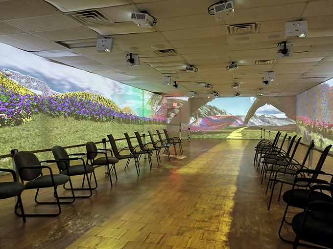 The immersive theater room projects Oz landscapes that transport visitors over the rainbow without the inconvenience of a Kansas tornado.