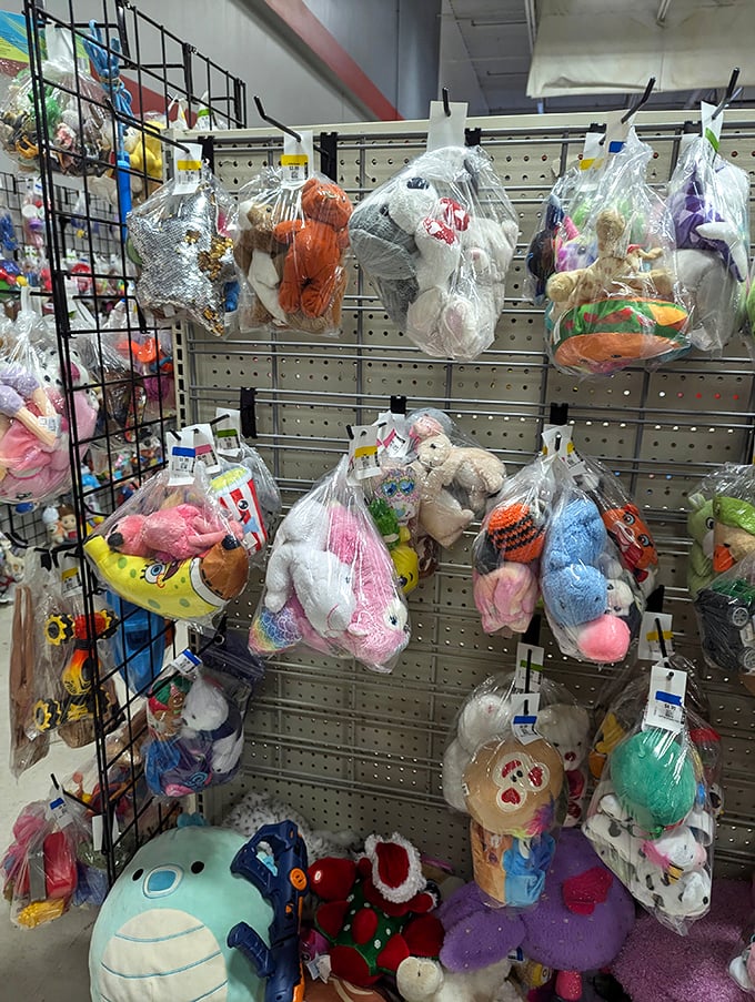 Plush toys bagged and tagged, waiting for their second chance at being loved. That banana with eyes has seen things.