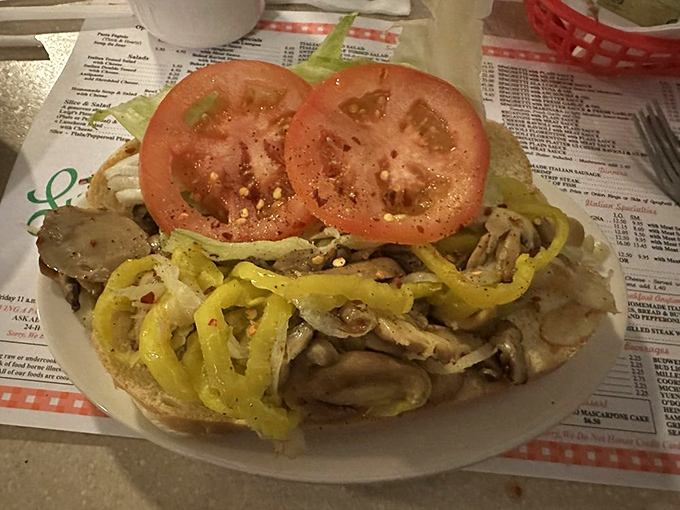 A sandwich that requires both hands and possibly a strategy meeting. Those fresh tomatoes add brightness to what might be Ohio's most satisfying handful.
