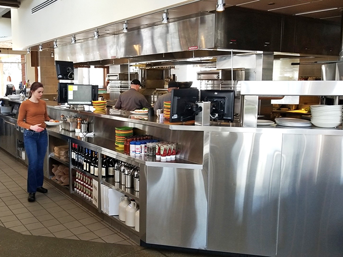 Stainless steel meets organizational brilliance in this kitchen view. Like watching a well-choreographed dance where the outcome is always something delicious.