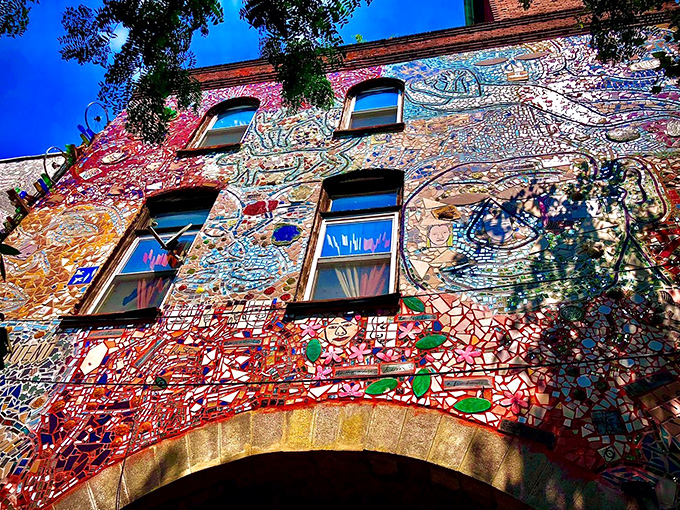 Not your average apartment view! These mosaic-covered windows frame daily life with extraordinary perspective and a serious case of curb appeal.