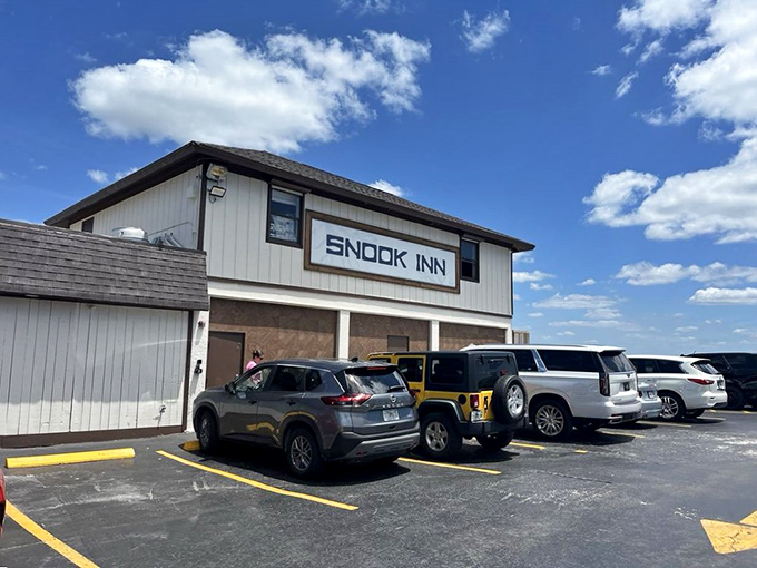 The Snook Inn keeps it simple outside so they can focus on perfection inside. That anchor isn't just decoration&mdash;it's keeping the good food anchored in place!