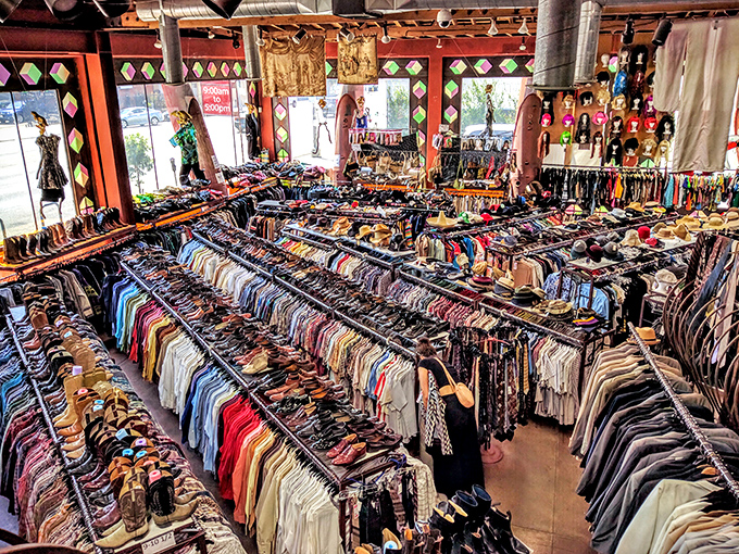 Organized chaos meets vintage paradise - where fashion history hangs on every carefully curated rack. 
