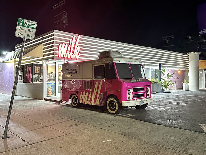 The pink truck glows like a dessert lighthouse in the night. Follow it to cereal milk ice cream dreams.