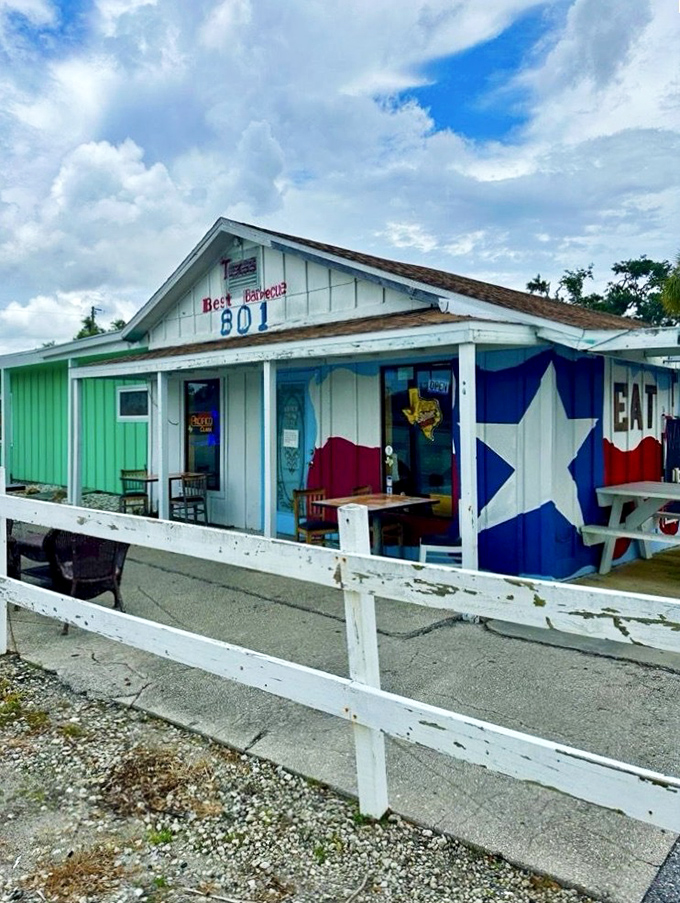 The blue, white, and red Texas pride on display isn't just decoration – it's a barbecue philosophy brought to Florida's Gulf Coast.
