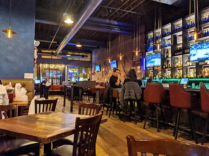 Industrial chic meets seafood sanctuary, with pendant lights casting a glow that makes everyone look like they've just returned from vacation.