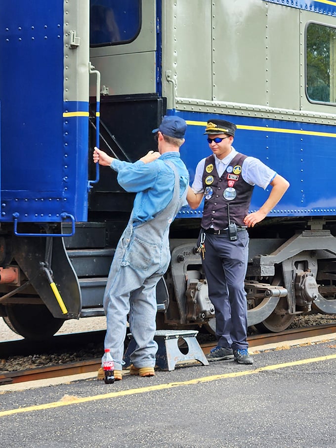 Railway operations require precision teamwork&mdash;these crew members coordinate with the easy confidence that comes from genuine passion for their craft.