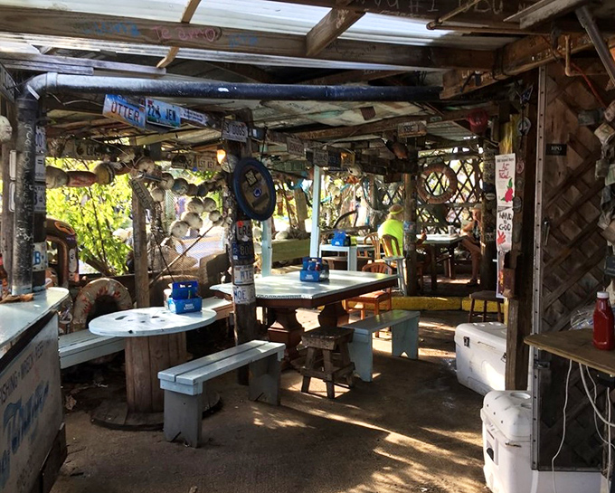 Mismatched tables and benches where strangers become friends. This isn't dining &ndash; it's a communal celebration of Florida's bounty.