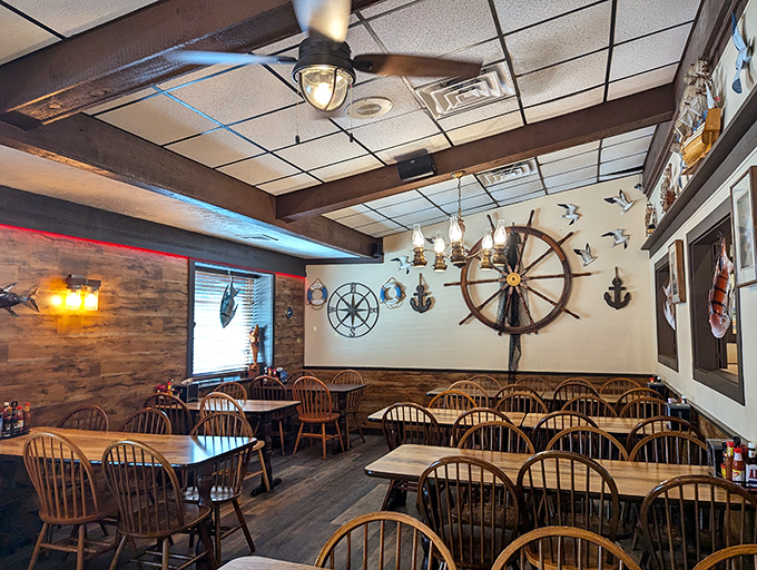 Nautical nostalgia meets dining comfort. That ship's wheel isn't just d&eacute;cor&mdash;it's steering you toward your next seafood adventure.